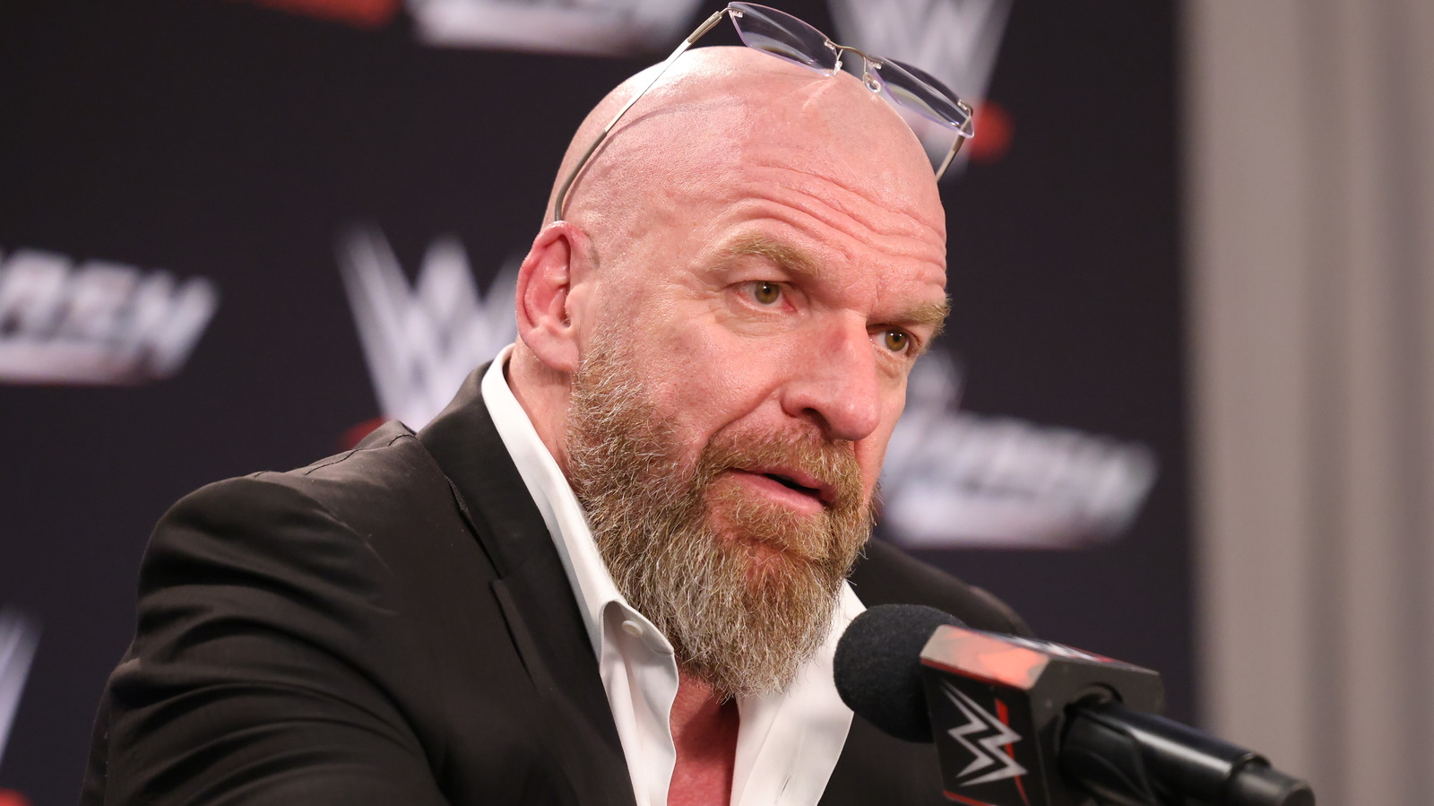 WWE CCO Triple H offers updates for two top star injuries that were ...